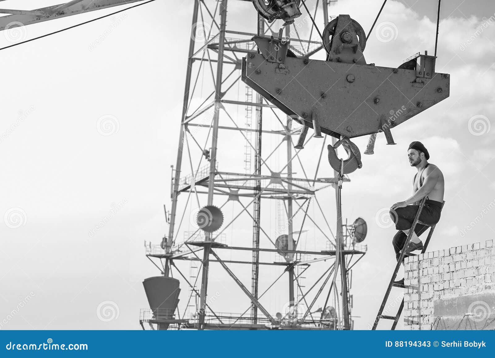 Retro Construction Worker Climbing a Ladder while Working on the Stock ...