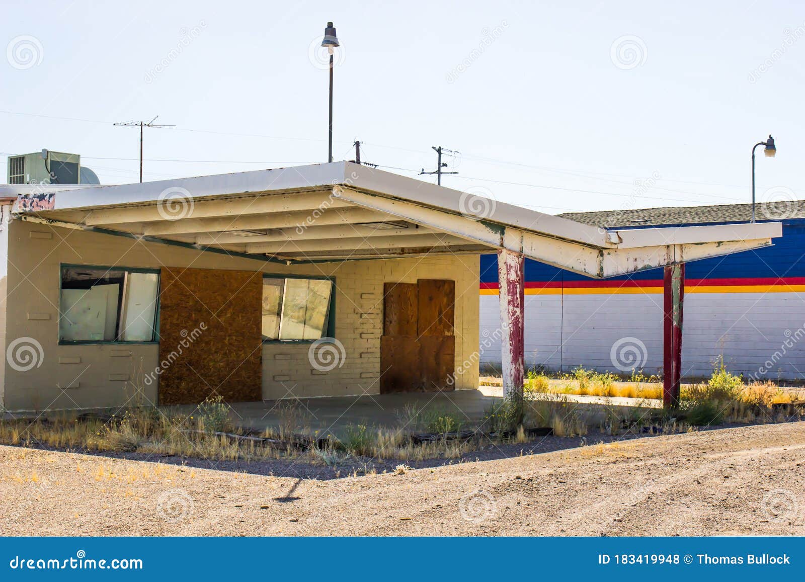 Retro Drive Thru Building with Boarded Up Doorway Stock Photo - Image ...