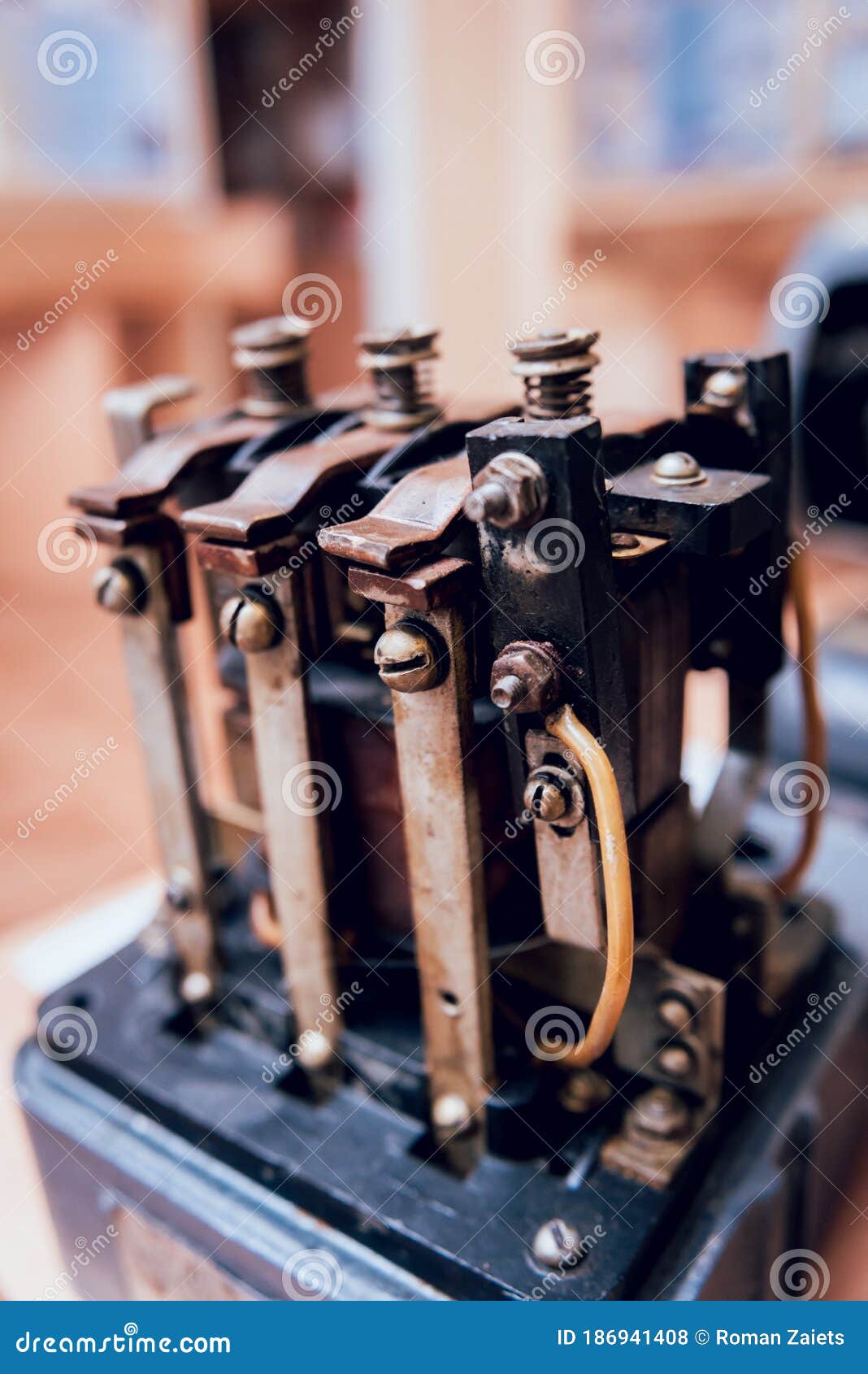 Retro Old Electrical Ceramic Insulators And Electric Wires On A Wooden ...