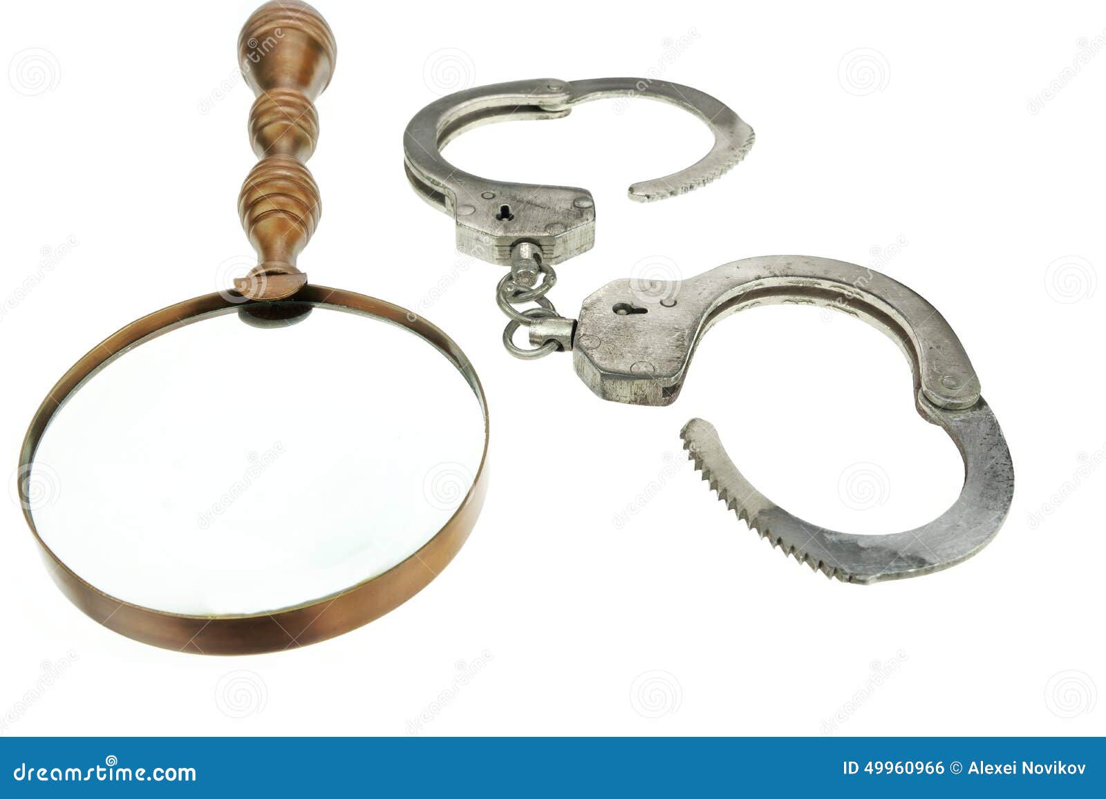 Retro Magnifying Glass and Handcuffs Stock Photo - Image of handcuffs ...
