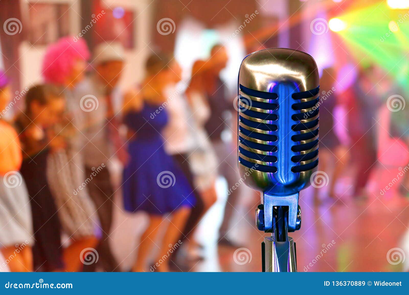 Retro Microphone at Concert with Crowd Dancing People and Empty Space ...