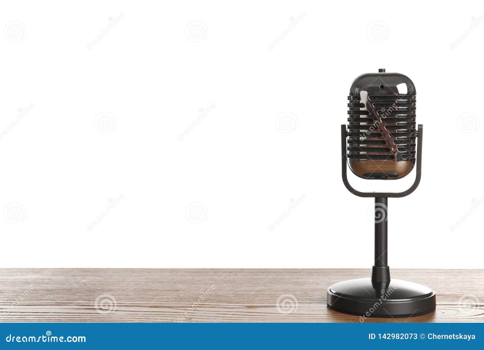Retro Microphone on Table Against White Background Stock Image - Image ...