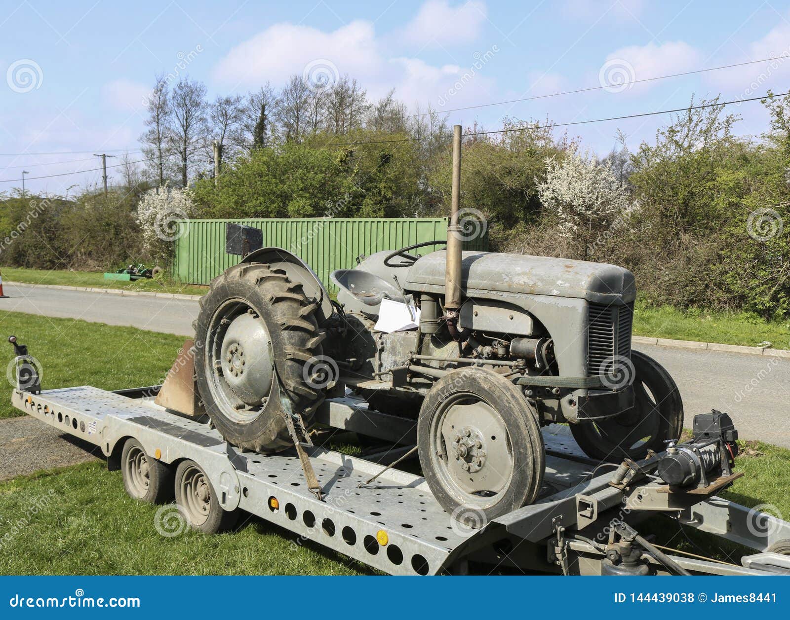 Old Tractor With Flat Tire And Field Cultivator Stock Photography ...