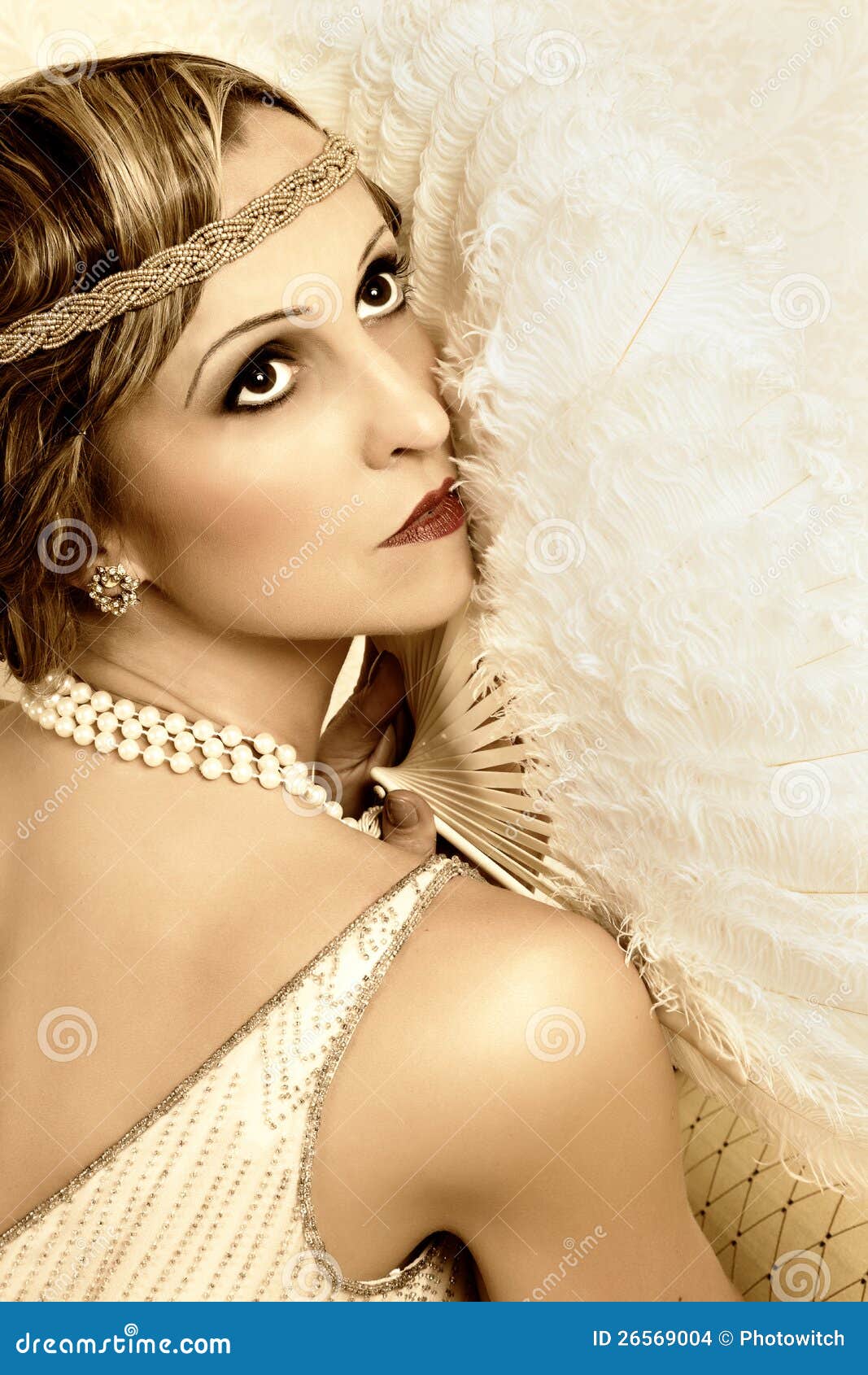 Retro Pose With Antique Fan Stock Photography | CartoonDealer.com #26569004