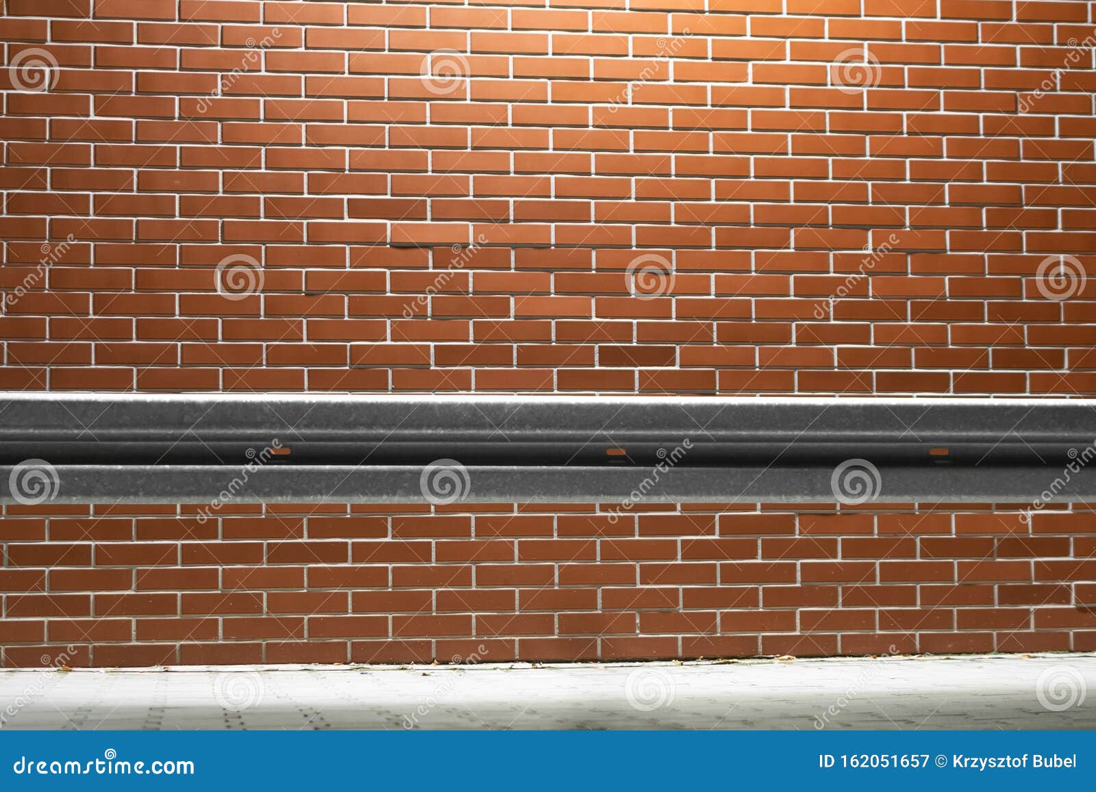 Retro Red Brick Wall and Cobblestone Pavement Stock Image - Image of ...