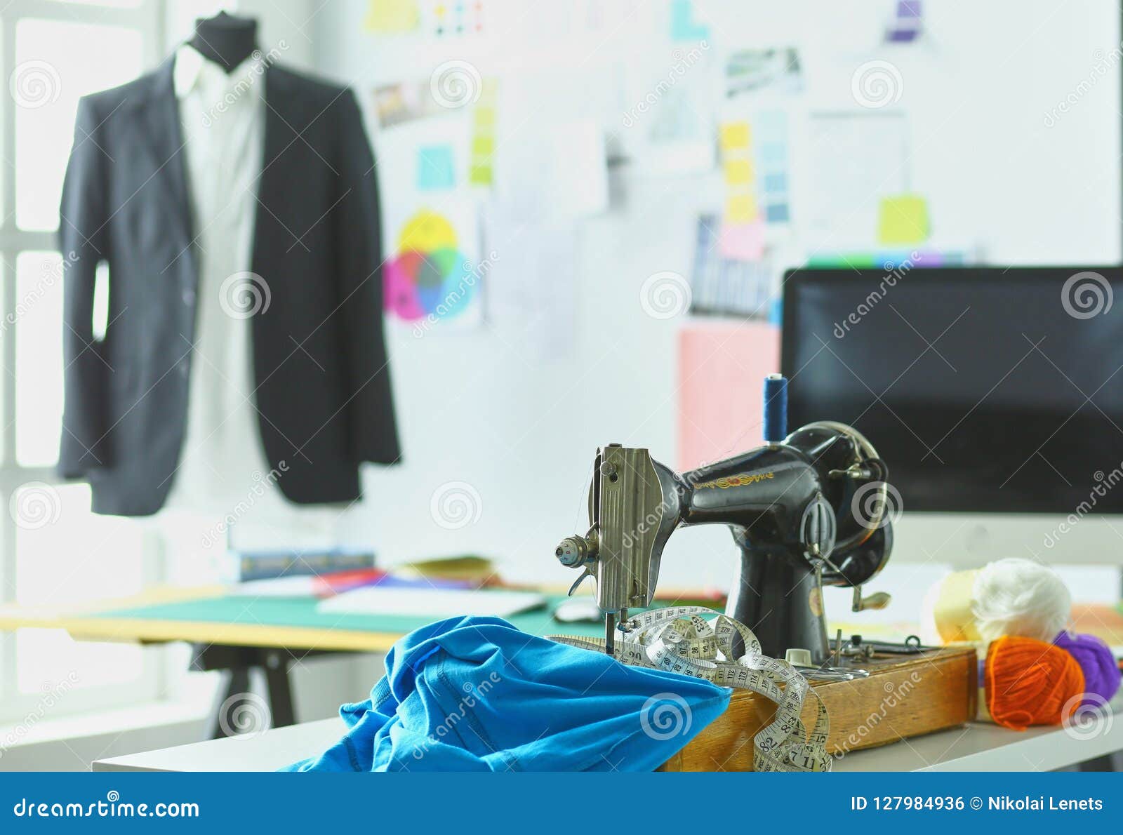 Retro Sewing Machine on Designer Clothes Desktop Stock Photo - Image of ...