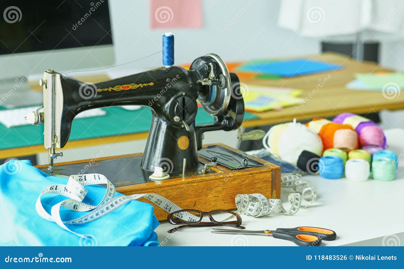 Retro Sewing Machine on Designer Clothes Desktop Stock Photo - Image of ...