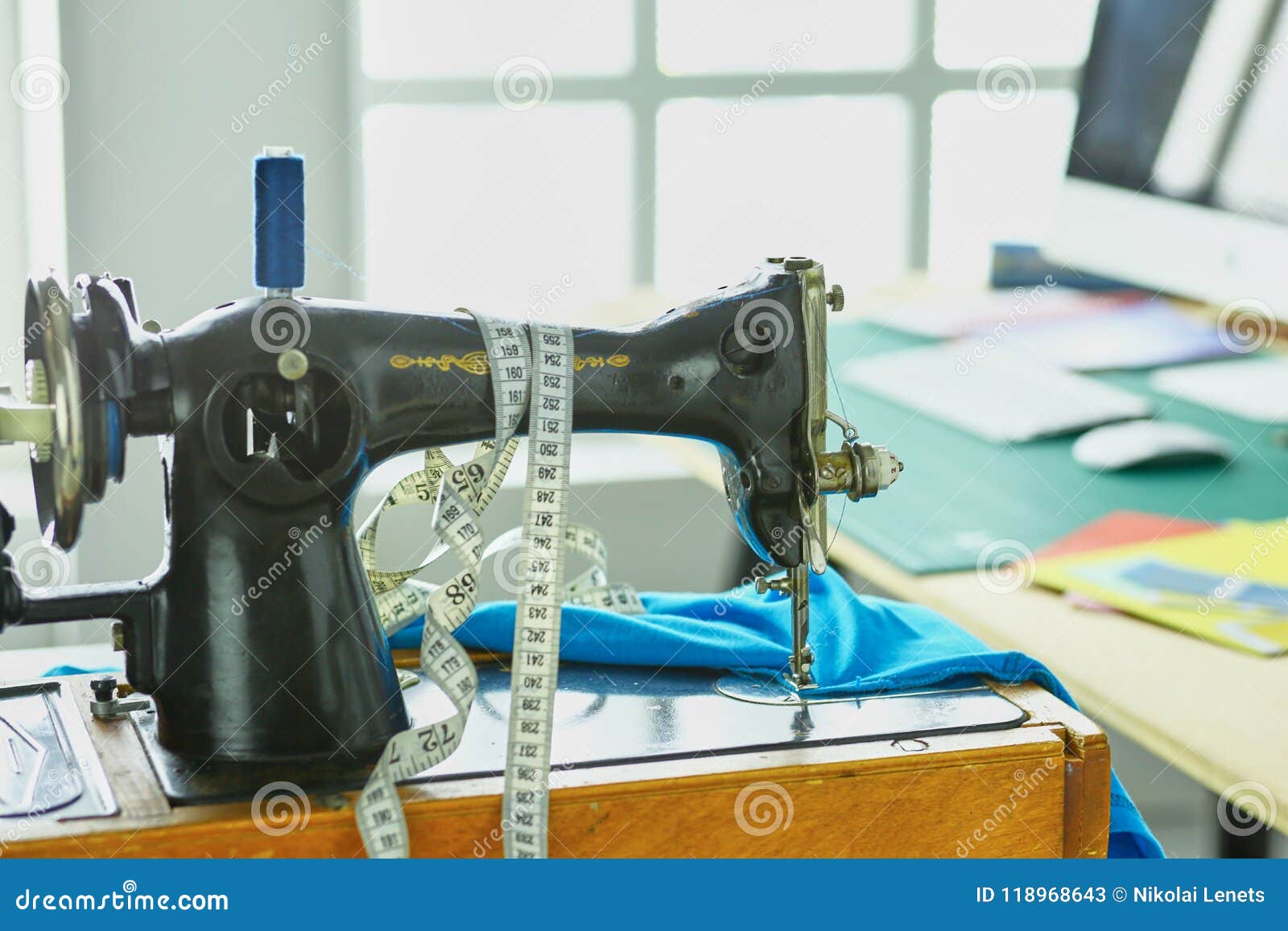 Retro Sewing Machine on Designer Clothes Desktop Stock Image - Image of ...