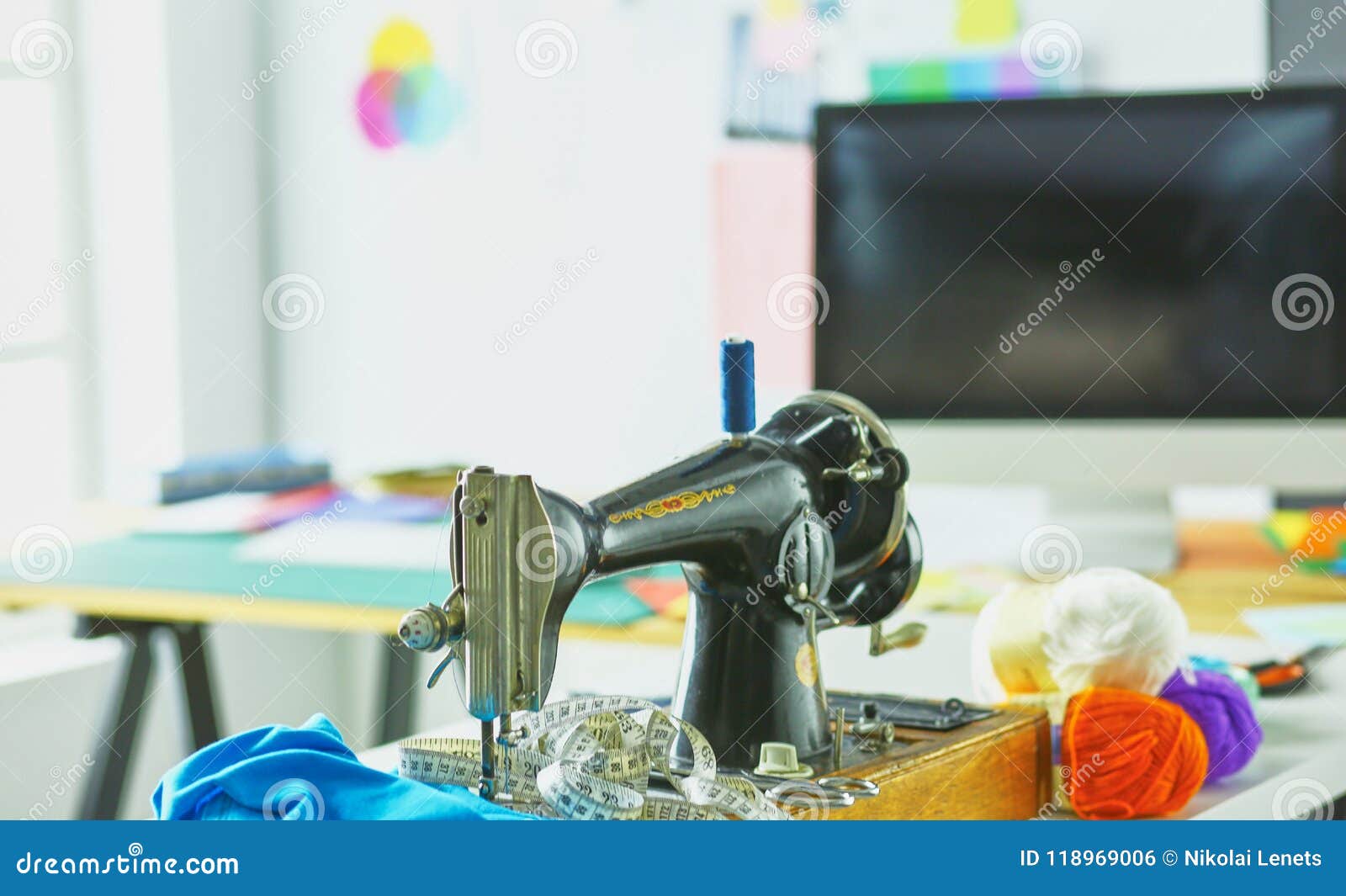 Retro Sewing Machine on Designer Clothes Desktop Stock Photo - Image of ...