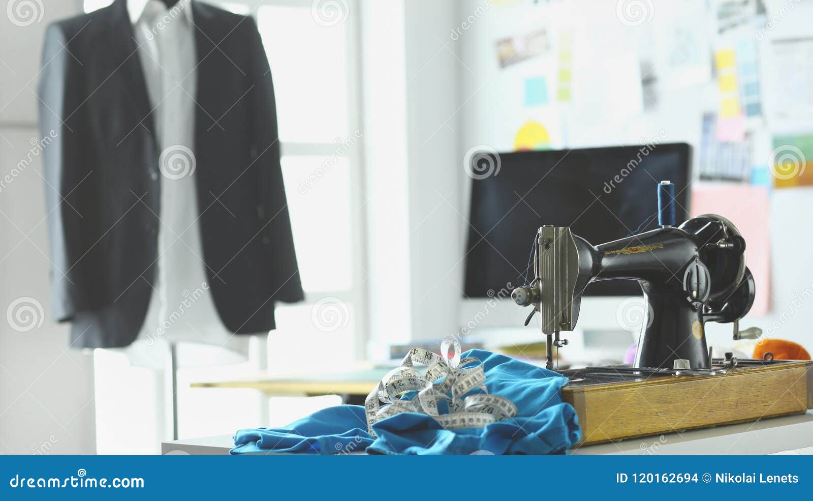 Retro Sewing Machine on Designer Clothes Desktop Stock Photo - Image of ...