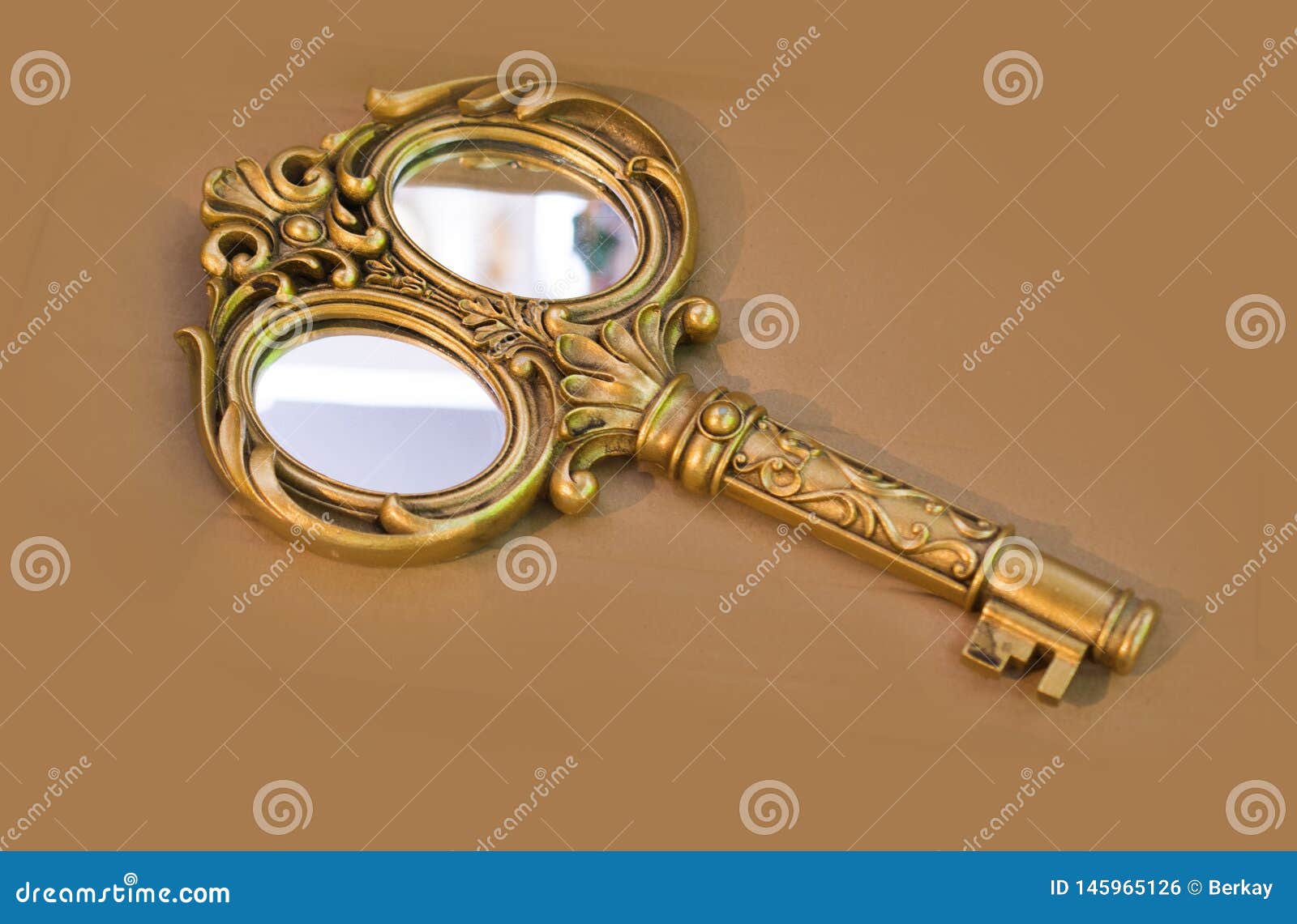 Retro Styled Golden Color Key with Mirror Stock Photo - Image of secret ...