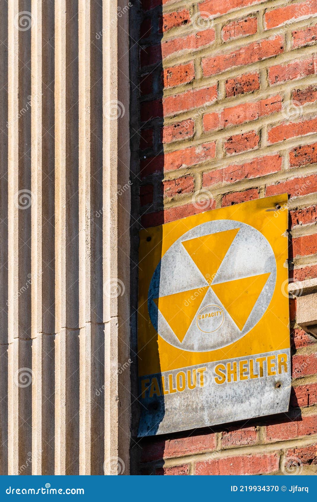 Retro Styled Nuclear Fallout Shelter Sign on a Red Brick Wall Stock ...