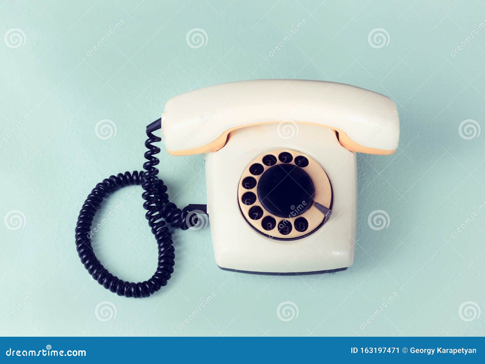 Retro Telephone Set with Disk Dialing on a Blue Background, Film Effect ...