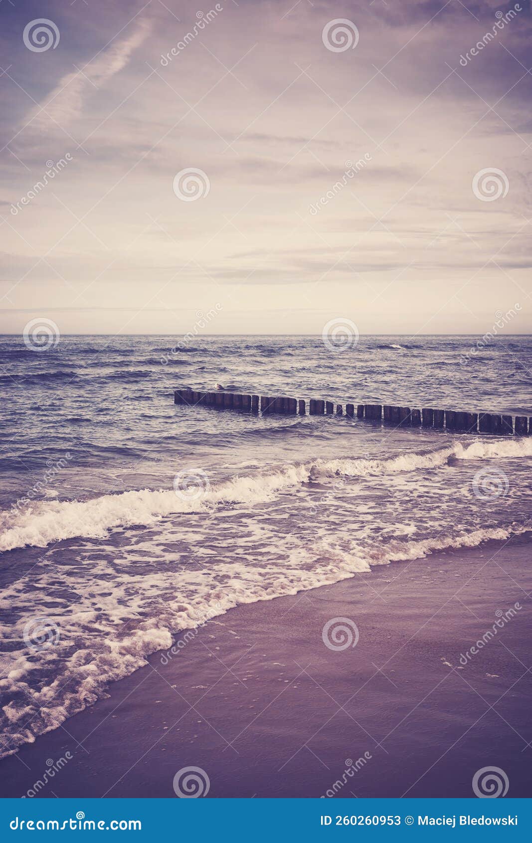 Retro Toned Picture of an Empty Beach Stock Image - Image of breakwater ...