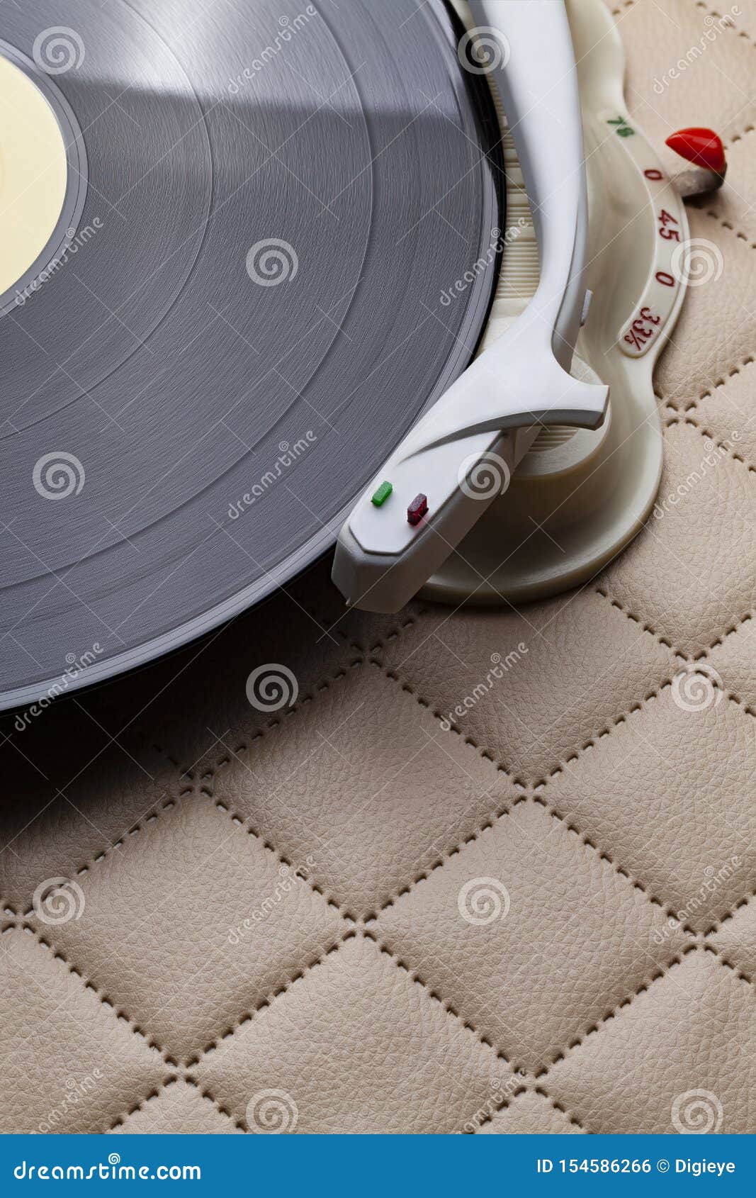 Retro Vinyl Player with Classic Vinyl Record on Leather Background ...