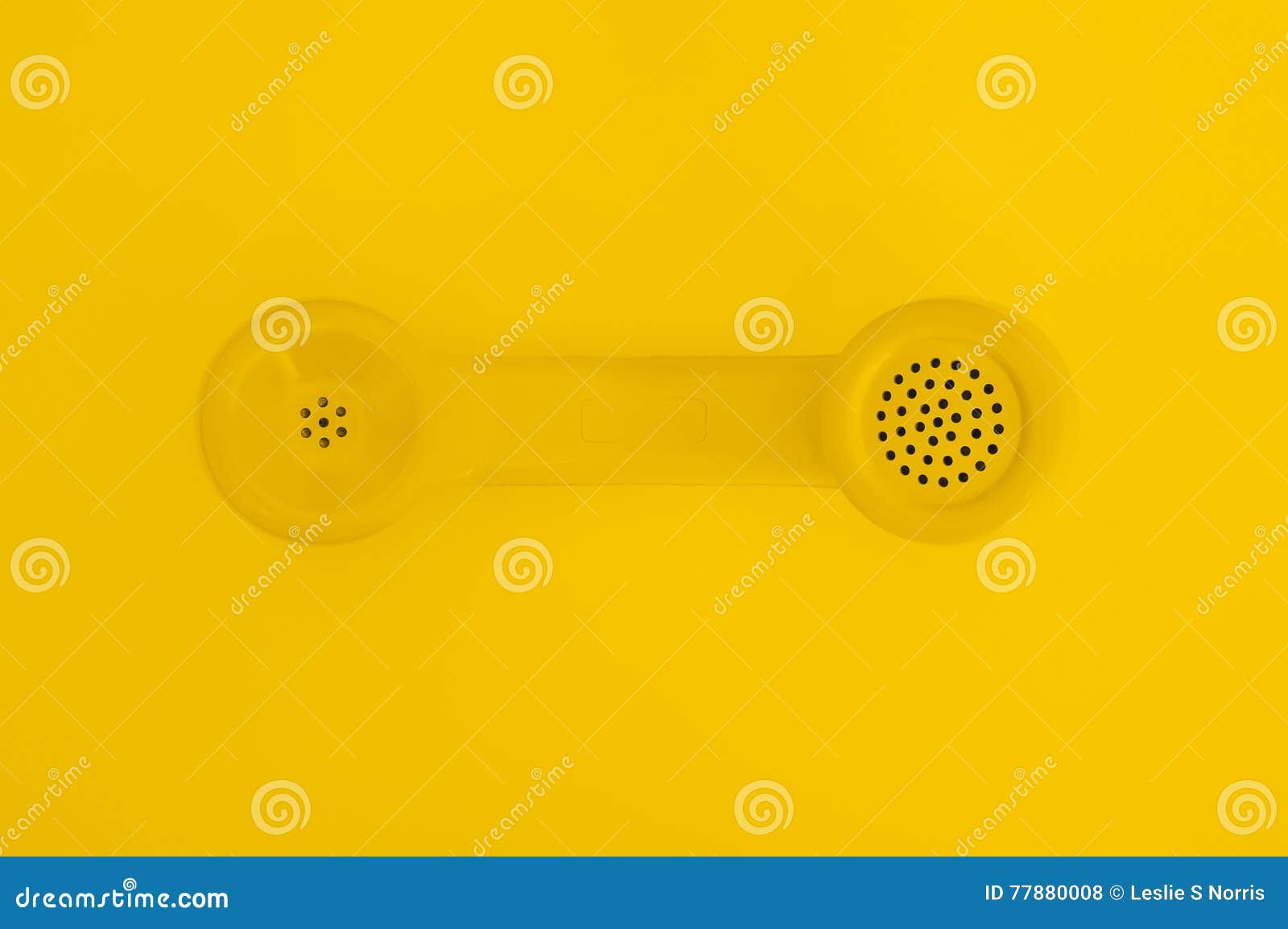 A Retro Yellow Telephone Handset on Yellow Background Stock Photo ...