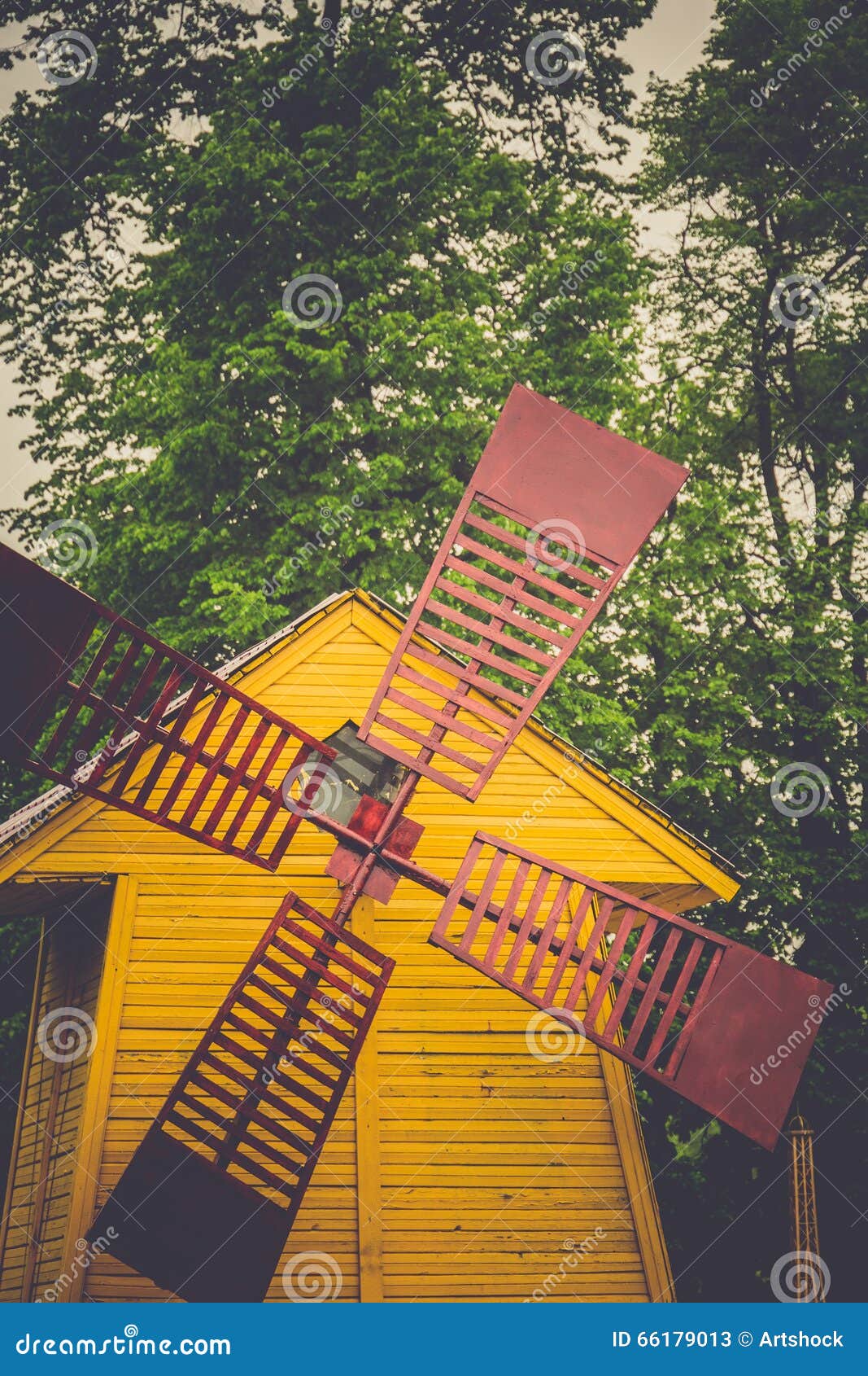 Retro Yellow Windmill stock image. Image of shape, wind - 66179013