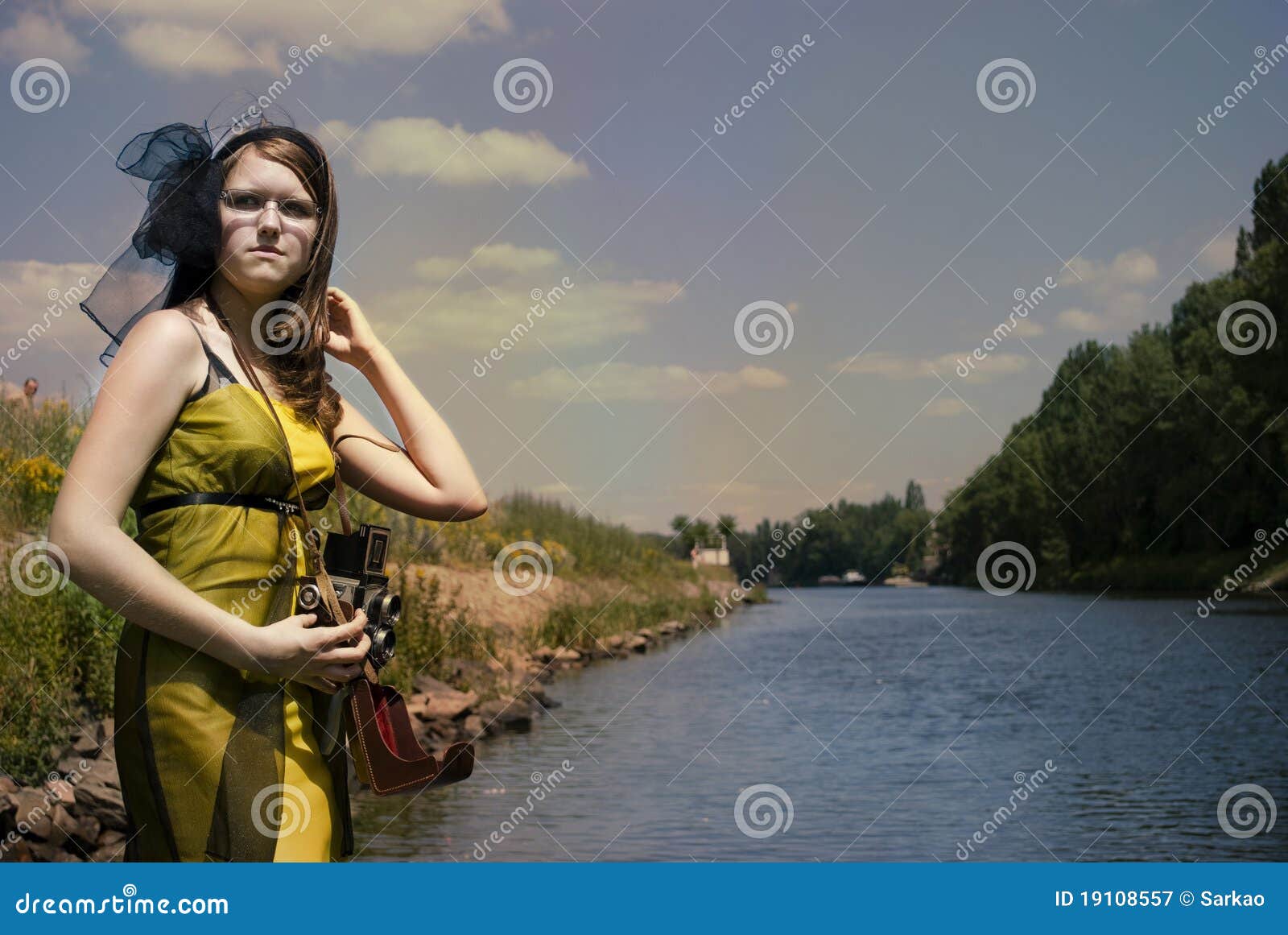 Retro Young Woman with Camera Near the River Stock Image - Image of ...