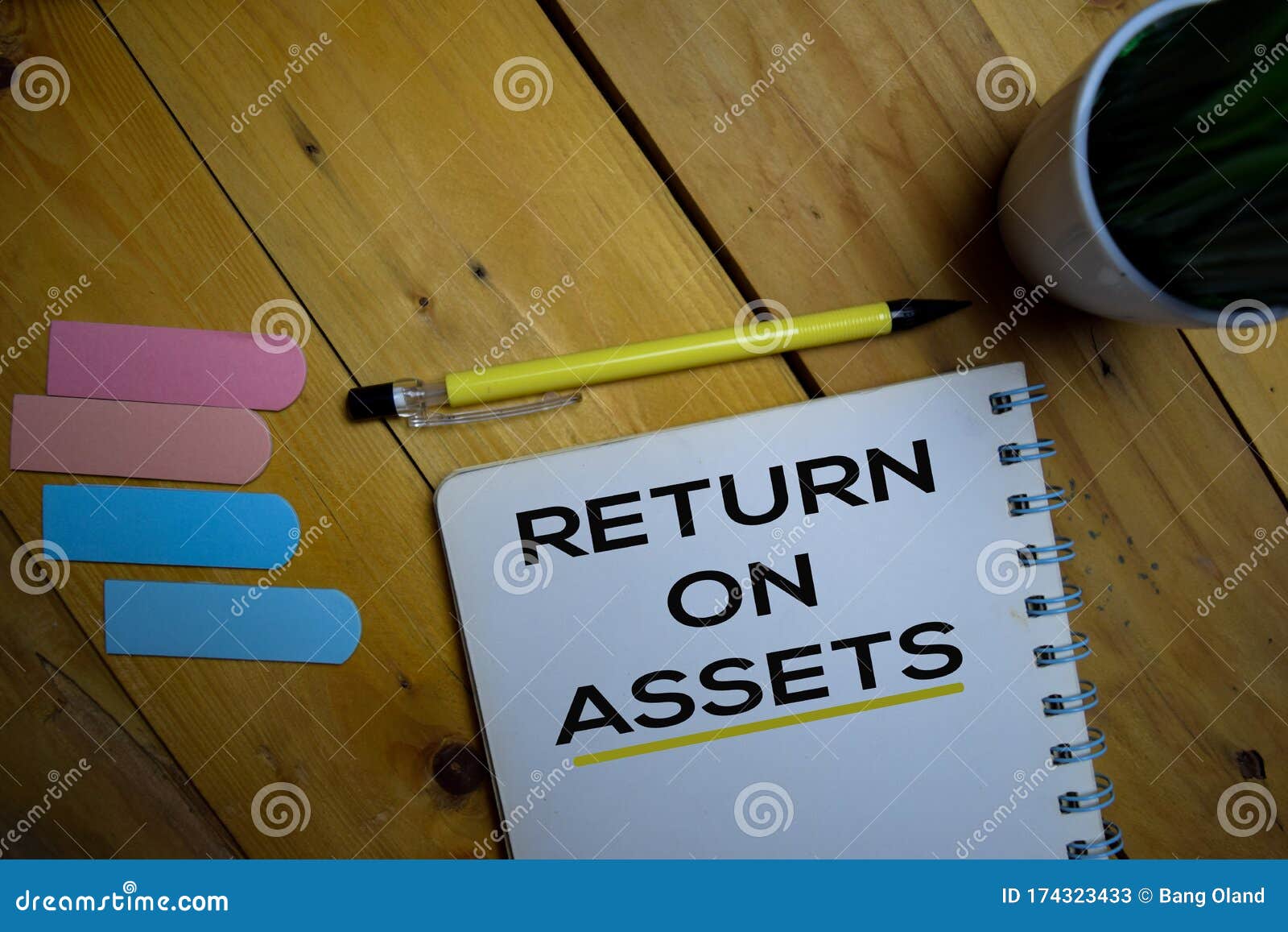 Return on Assets Write on a Book Isolated on Wooden Background Stock ...
