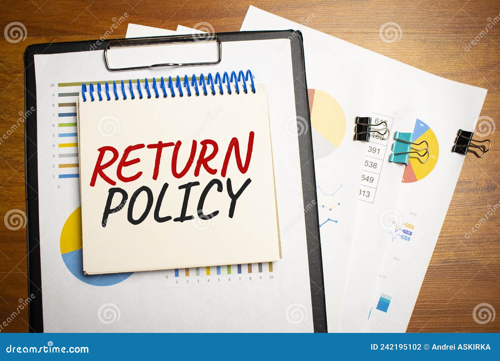 RETURN POLICY Text on the Notebook with Office Supplies on White ...