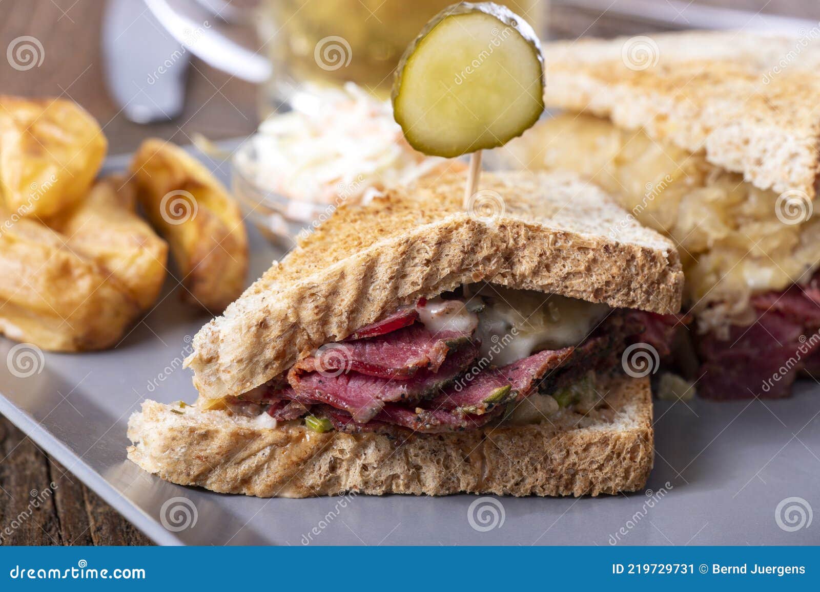Reuben sandwich stock image. Image of gherkin, fries - 219729731