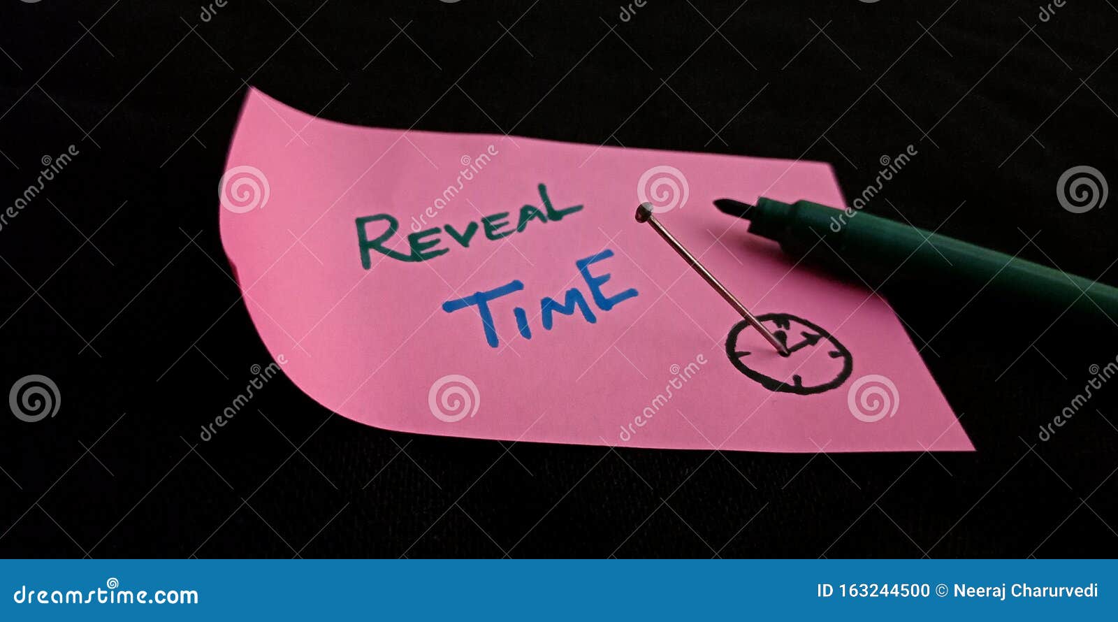 Reveal Time Displayed on Pink Colour Slip on Black Background with Pen ...