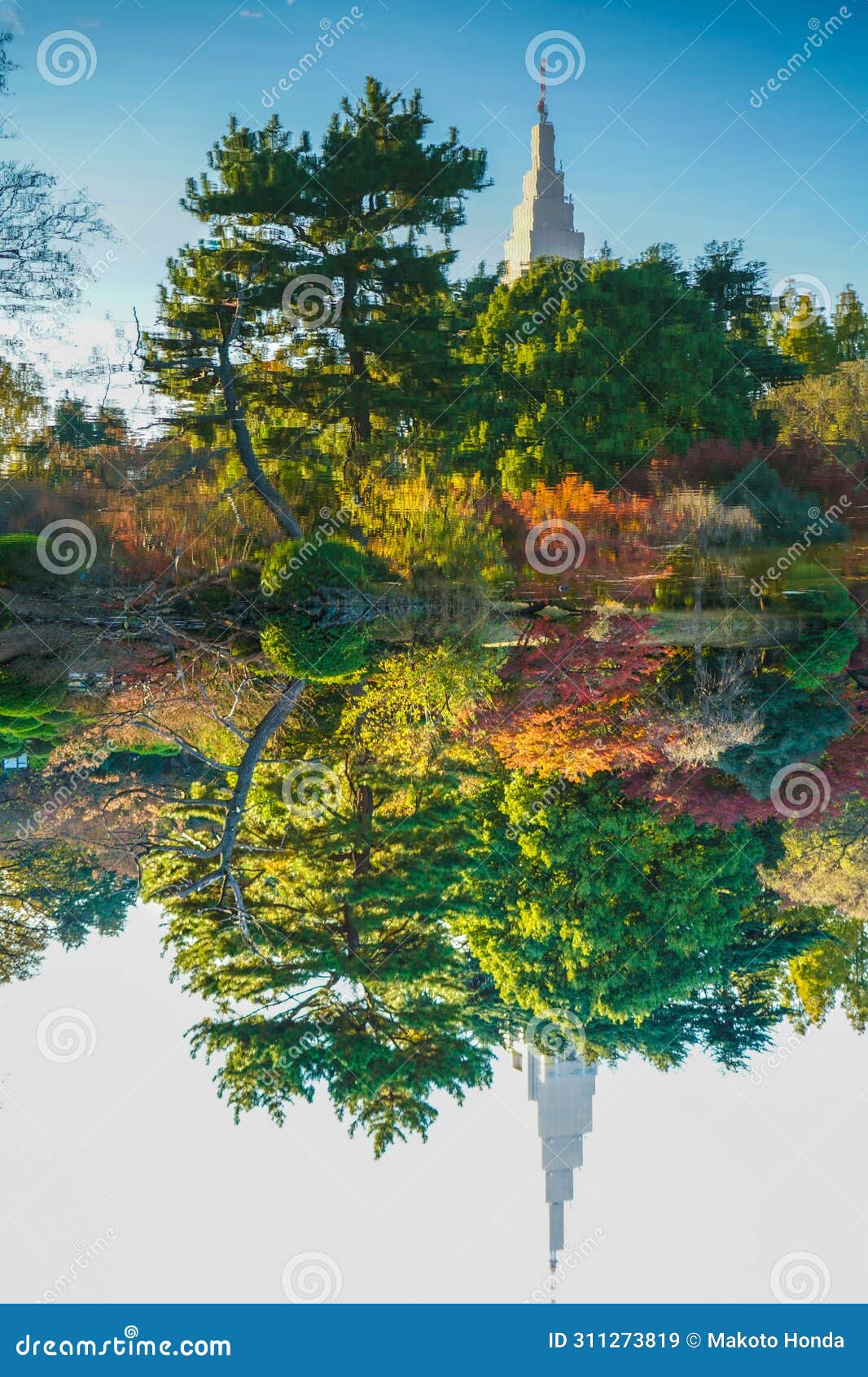 Reverse Statue of the Tower Reflected on the Mirror Surface Stock Image ...