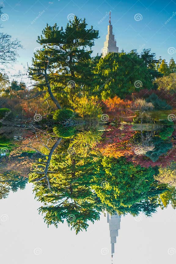 Reverse Statue of the Tower Reflected on the Mirror Surface Stock Image ...