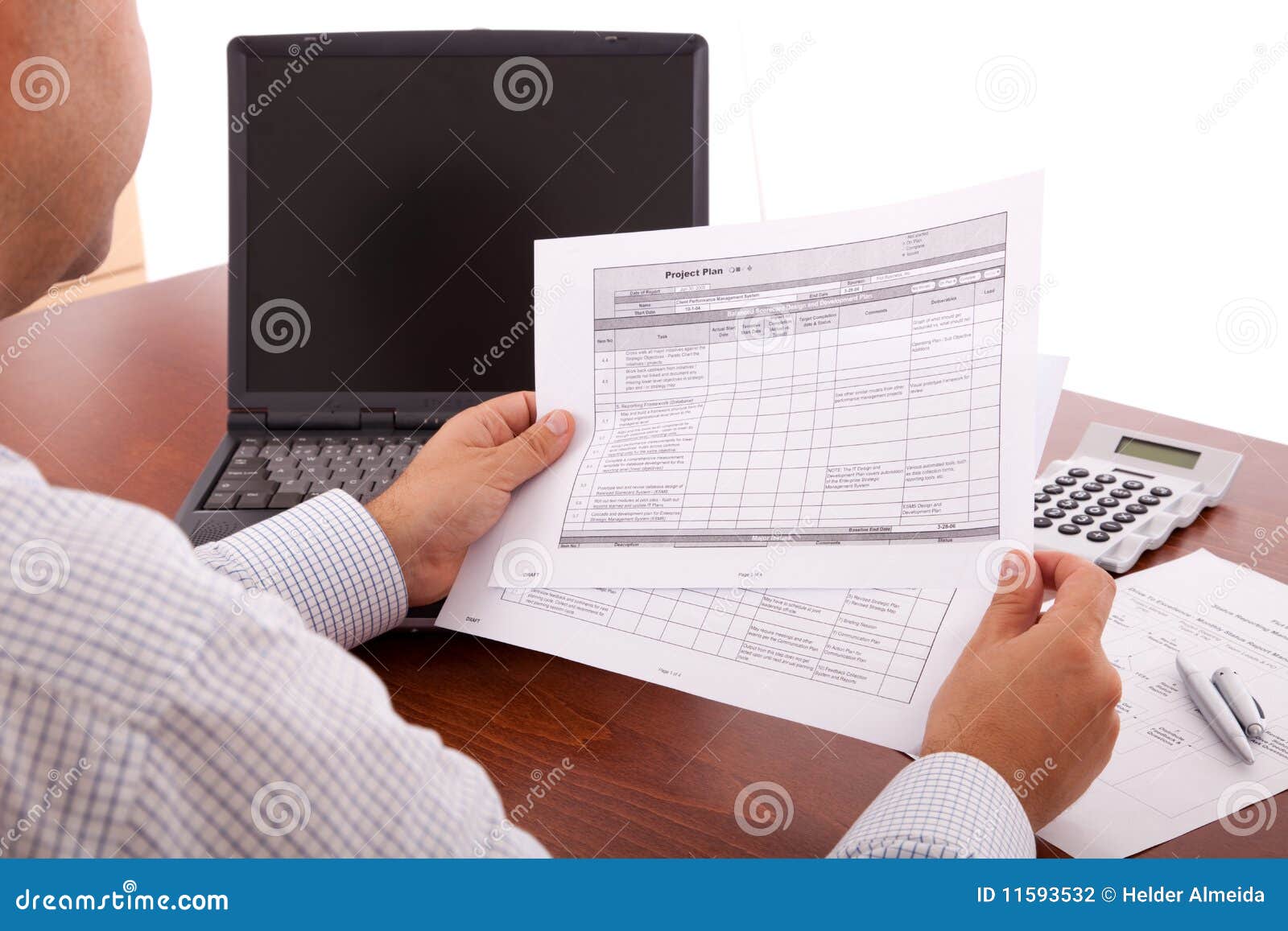 Reviwing the project stock photo. Image of businessman - 11593532