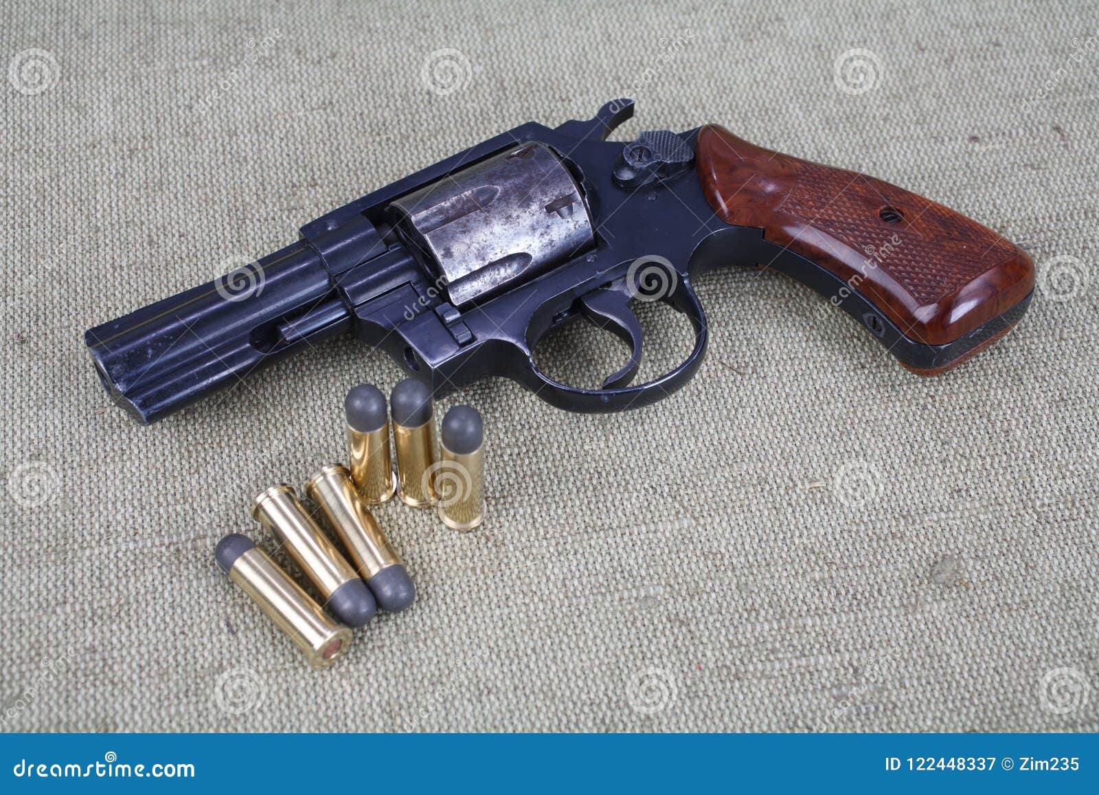 Revolver with ammunition stock image. Image of hand - 122448337