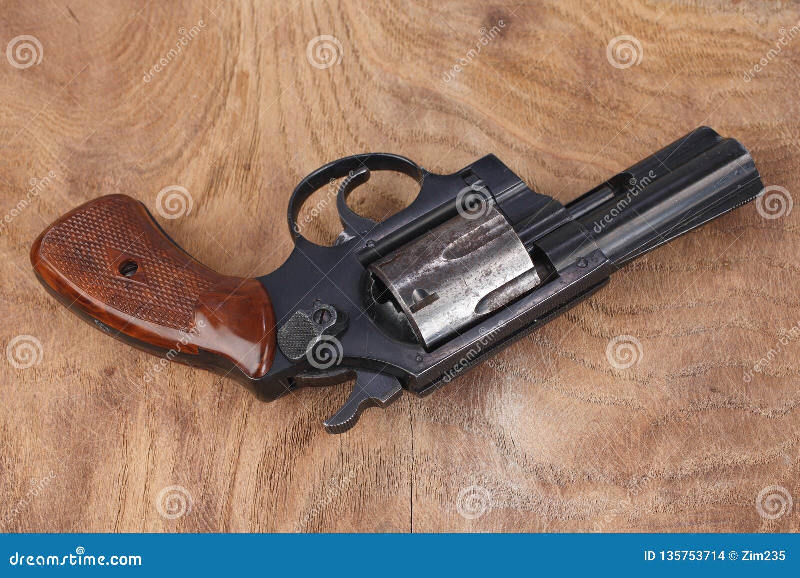 Revolver with ammunition stock photo. Image of grip - 135753714