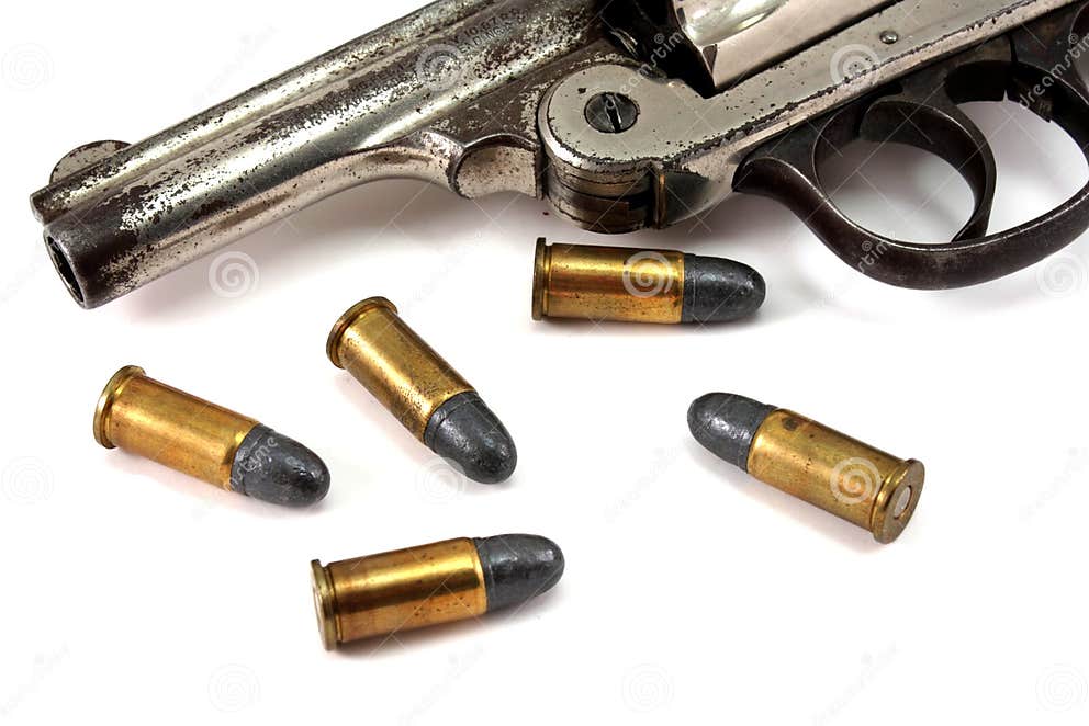 Revolver and Bullets stock photo. Image of machinegun - 8144506