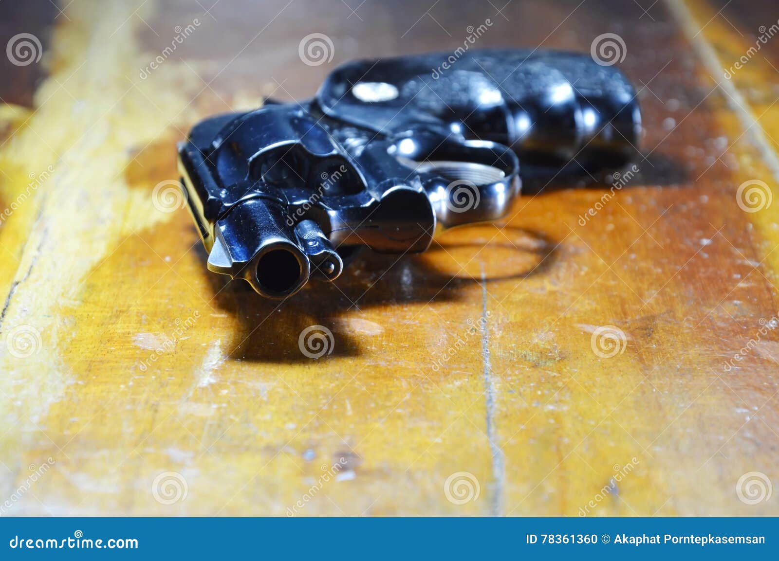 Revolver Gun on Wooden Table Stock Photo - Image of object, table: 78361360