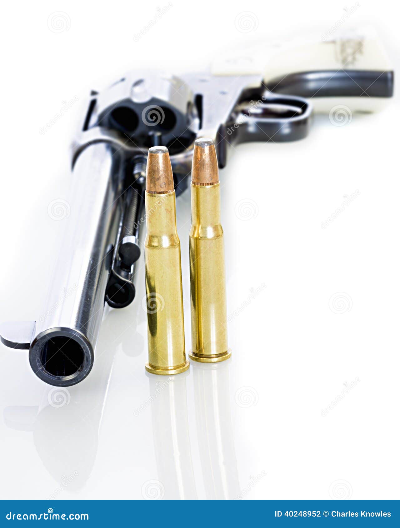 Revolver Pistol and Bullets Stock Photo - Image of ammunition, bullets ...