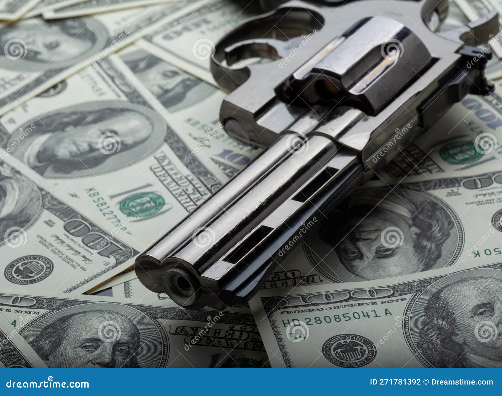 Revolver pistol and money stock photo. Image of brand - 271781392