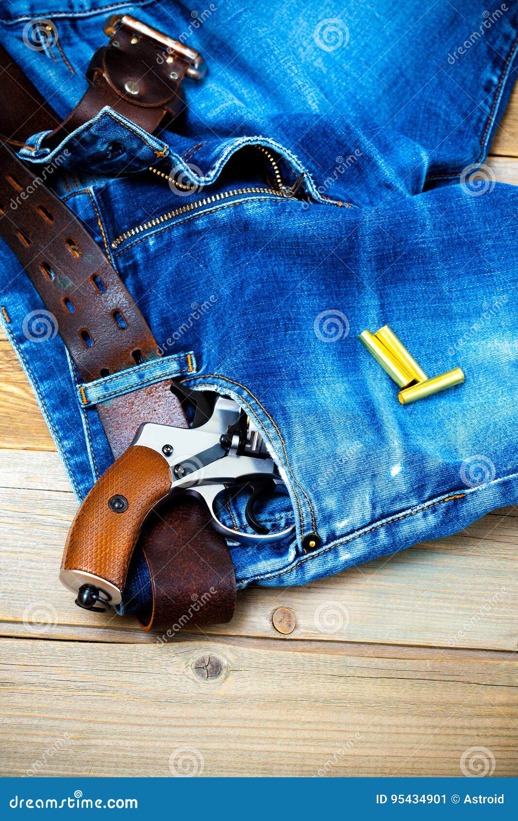 Revolver in the pocket stock image. Image of belt, nagan - 95434901