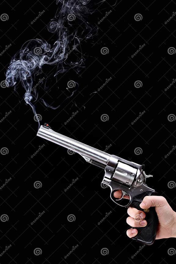 Revolver with smoke stock photo. Image of grip, millimeter - 19135986