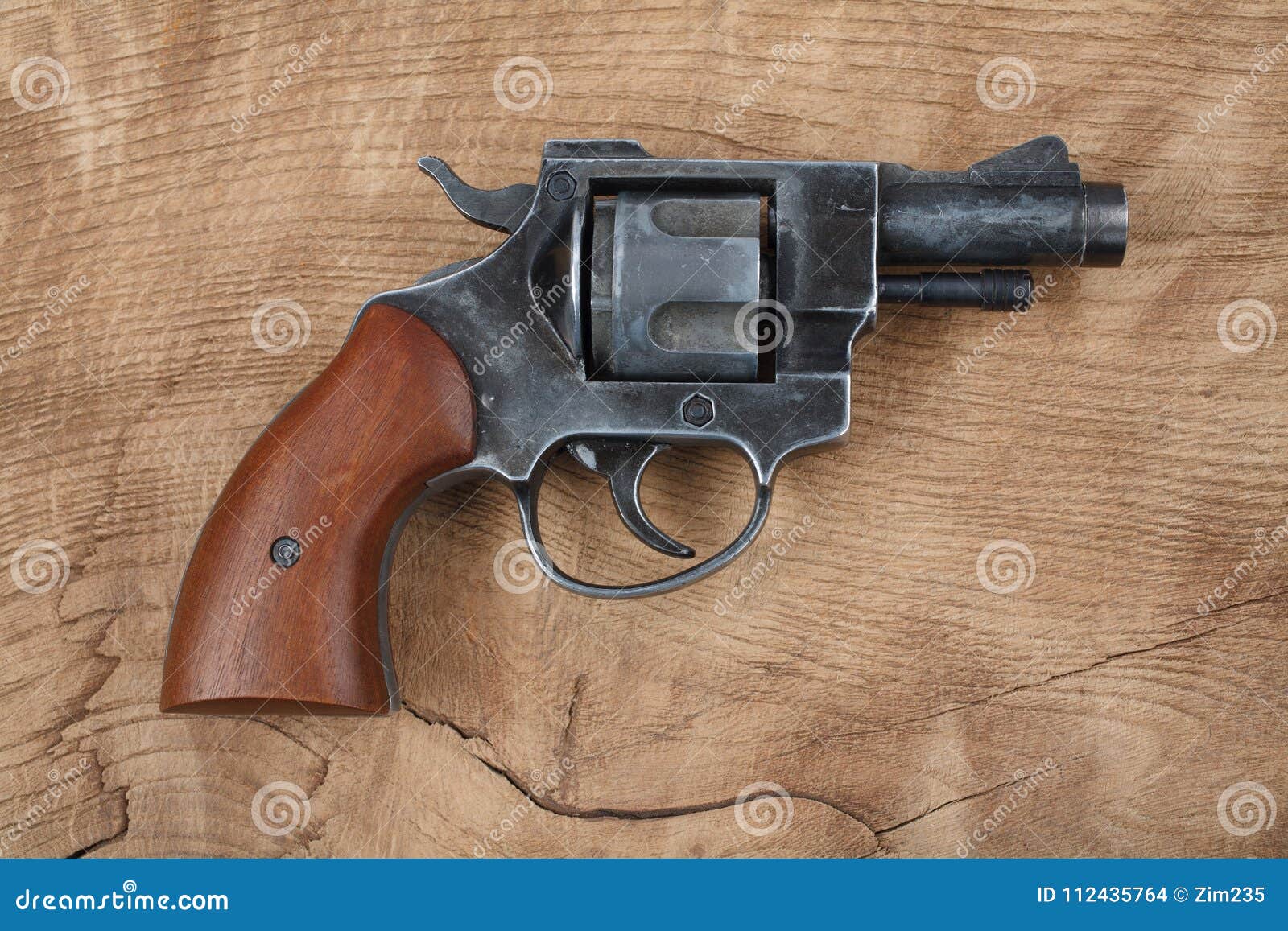 Revolver on the table stock photo. Image of black, caliber - 112435764