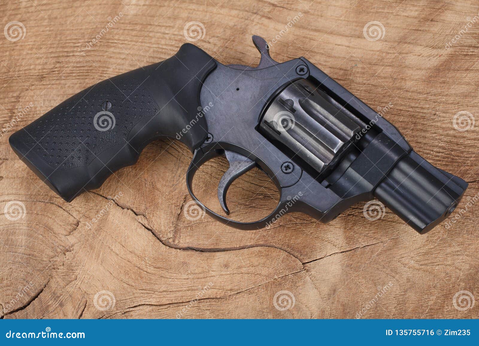 Revolver on the Wooden Table Stock Photo - Image of barrel, handle ...