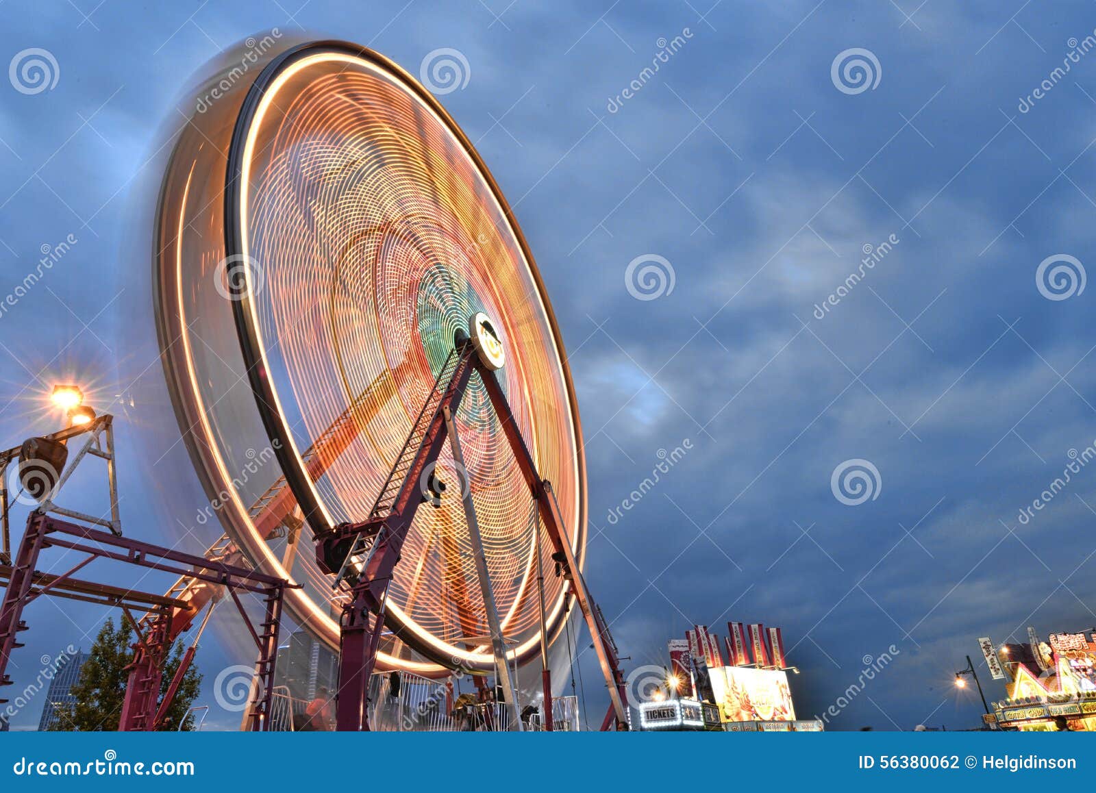 Revolving ferris wheel stock photo. Image of happy, carnival - 56380062