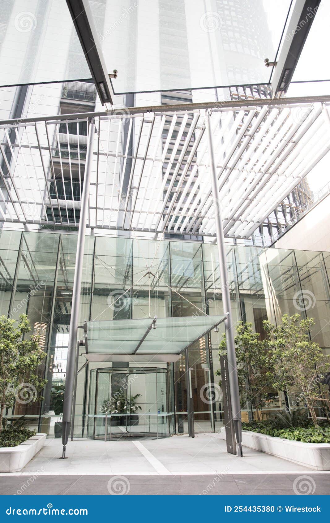 Revolving Glass Doors in a Modern Office Building Stock Photo - Image ...