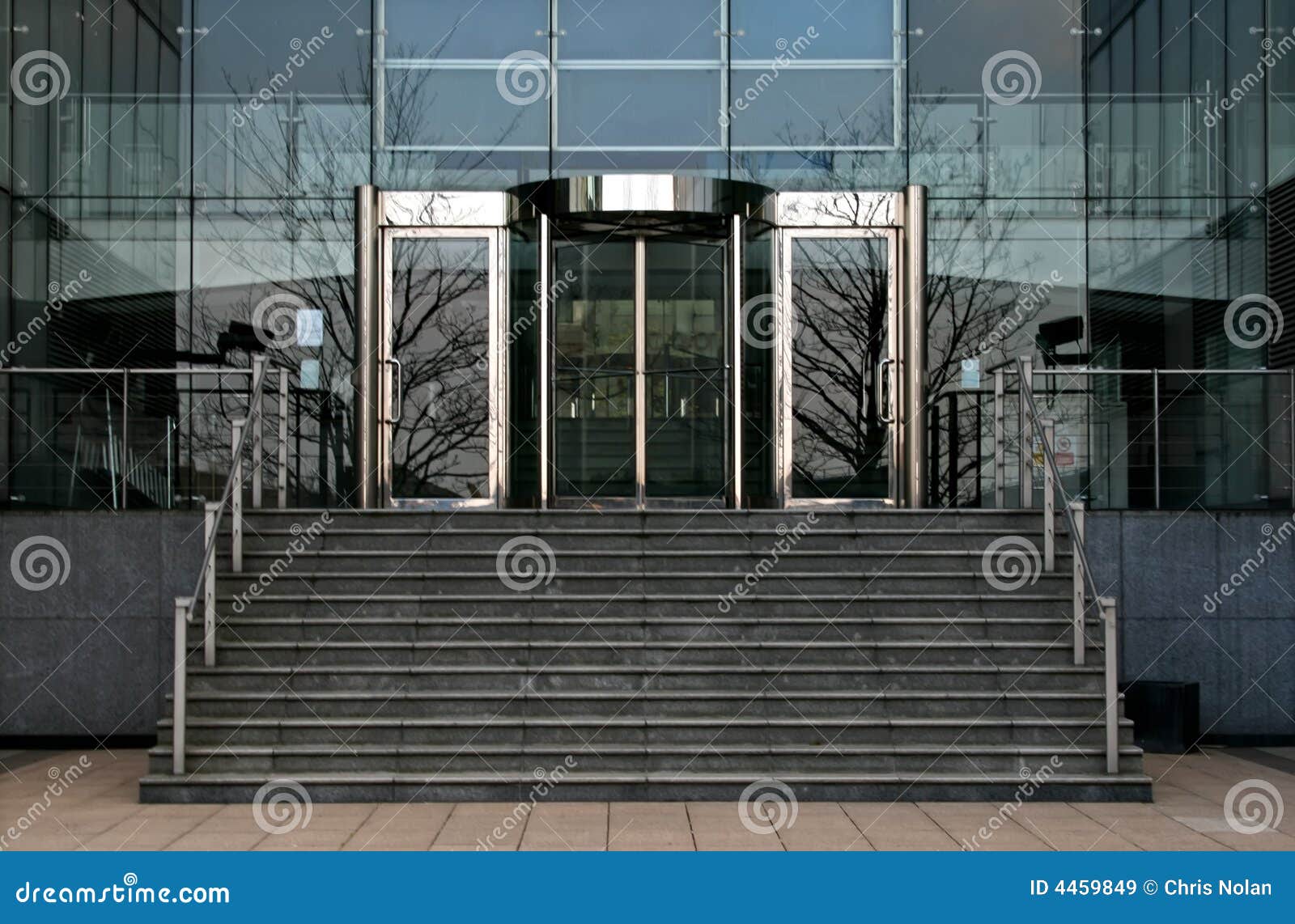 Revolving Glass Office Doors Stock Image - Image of building, steel ...