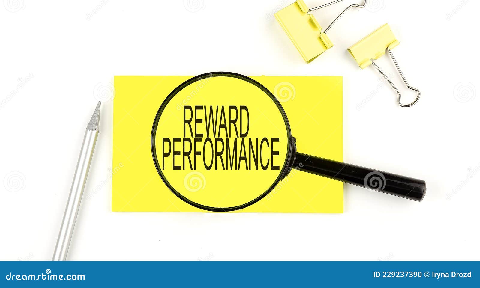 REWARD PERFORMANCE Text on the Sticker through Magnifier. View from ...