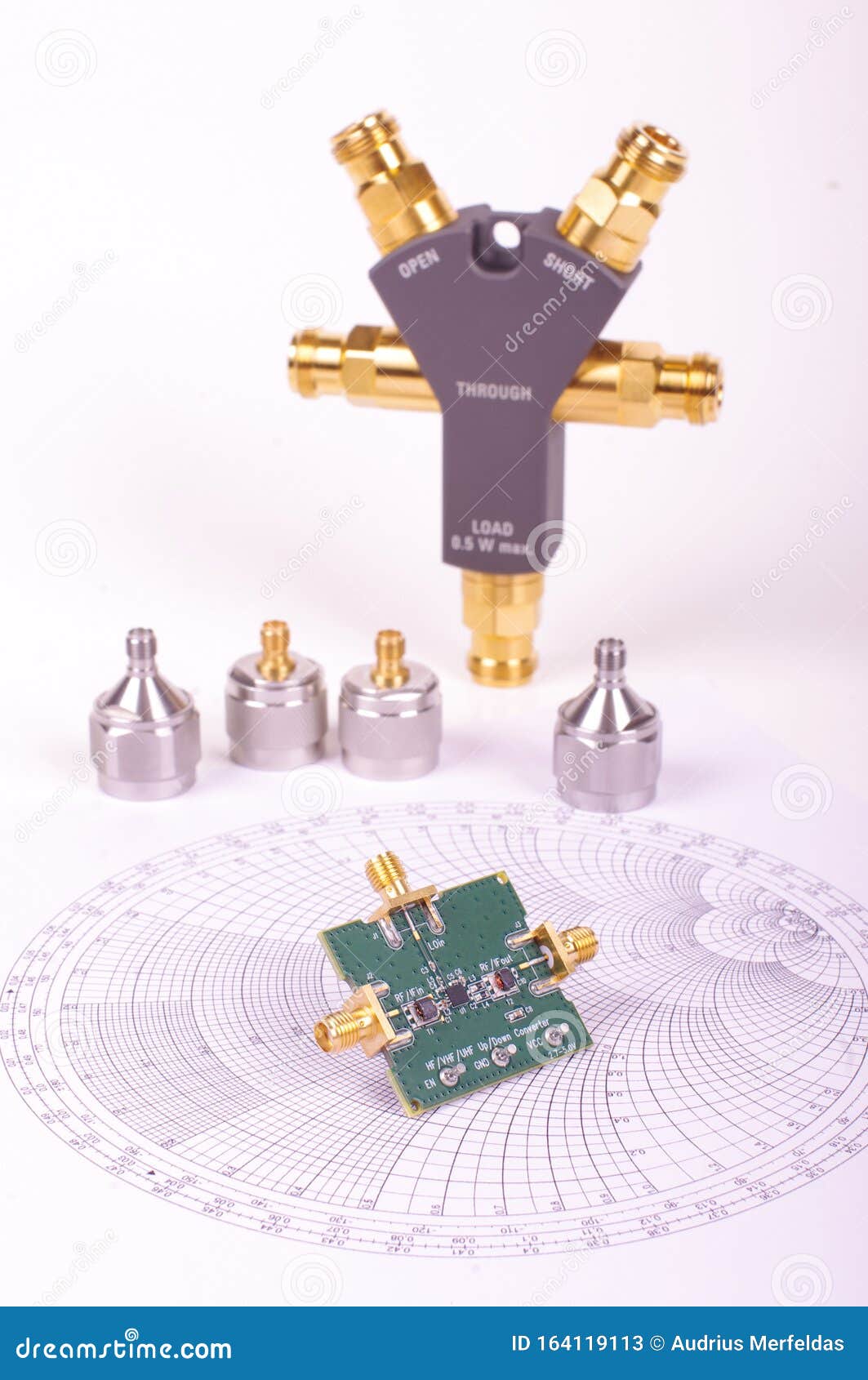 RF Mixer Electronics PCB in Front of Smith Chart and Other Microwave ...