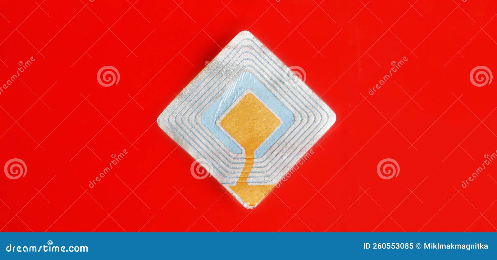 RFID Tag Transponder Label on a Bright Red Background. the Concept of ...