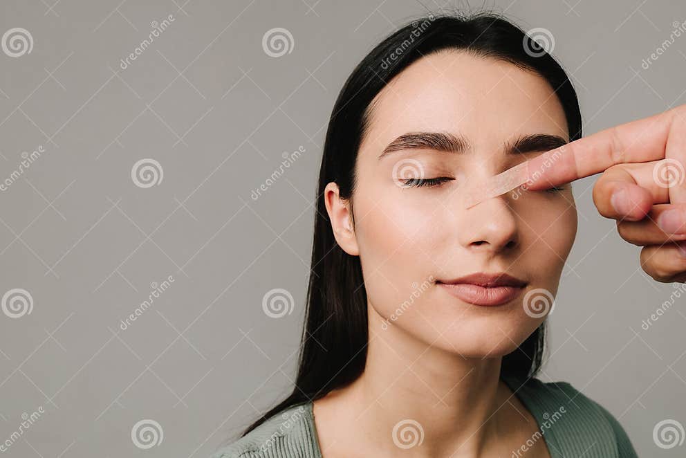 Rhinoplasty. Plastic Surgeon is Taping Nose To Patient during ...