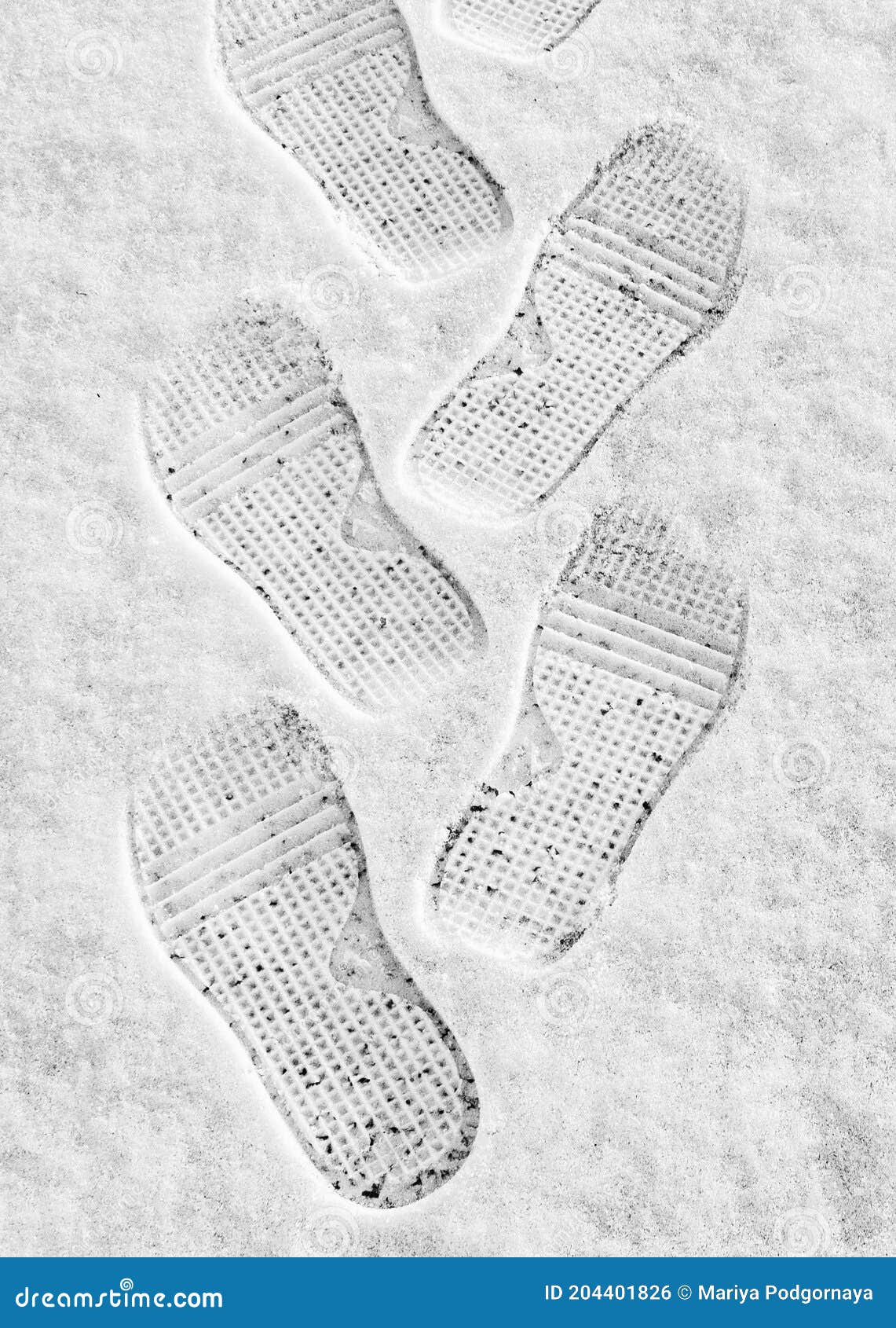 Rhythmic Boot Prints on Thin White Snow in Winter Recede into the ...