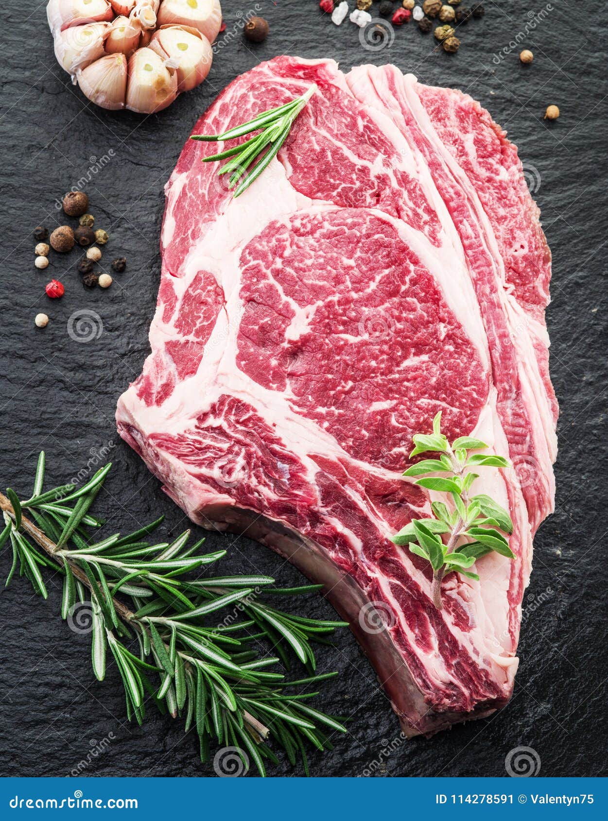 Rib Eye Steak with Spices on the Black Background. Stock Image - Image ...