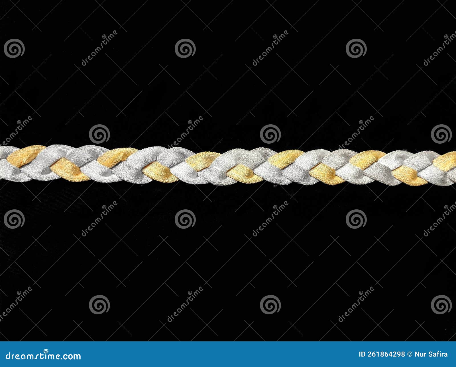 A Ribbon Braided with a Mix of Gold and Silver Stock Photo - Image of ...