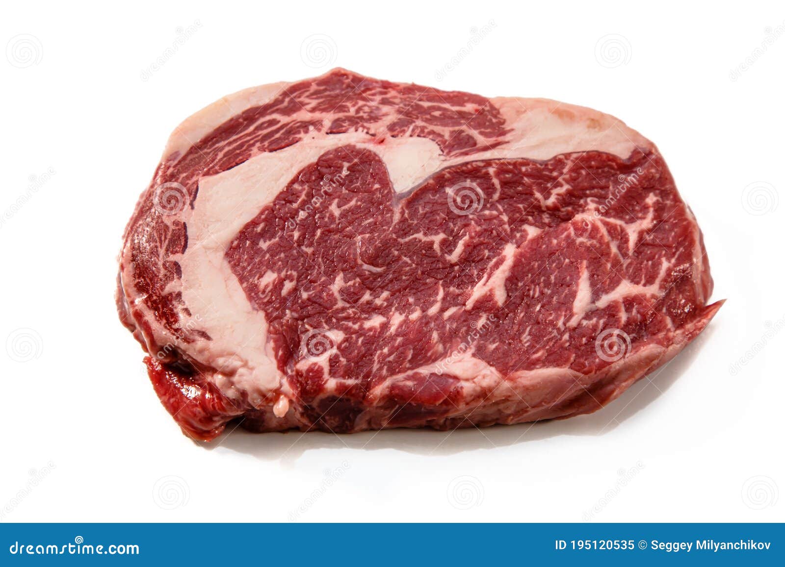 Ribeye. a Raw Marbled Beef Steak Sits on a White Background with a ...